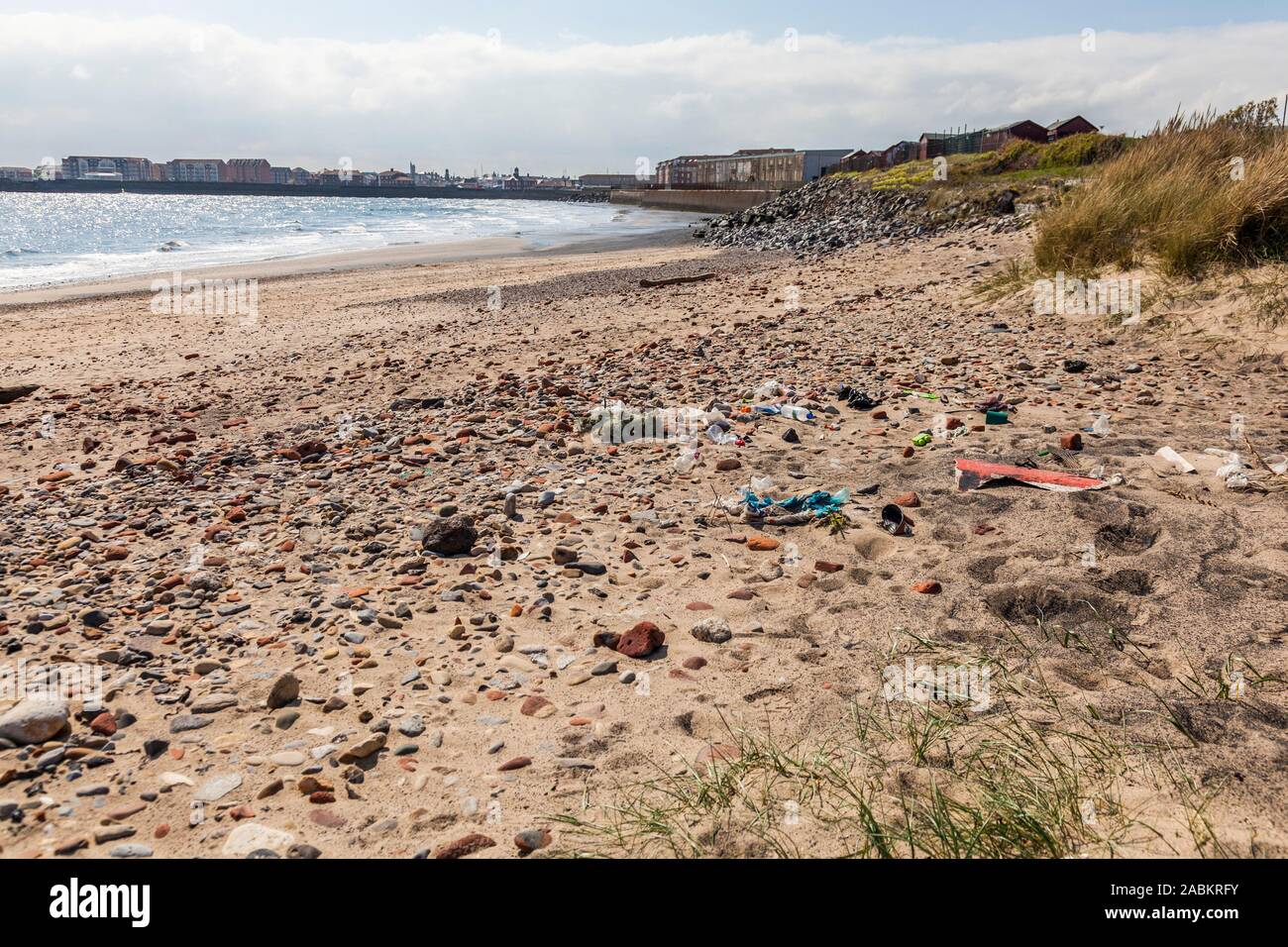 Several items of plastic bottles etc. discarded or washed up on the ...