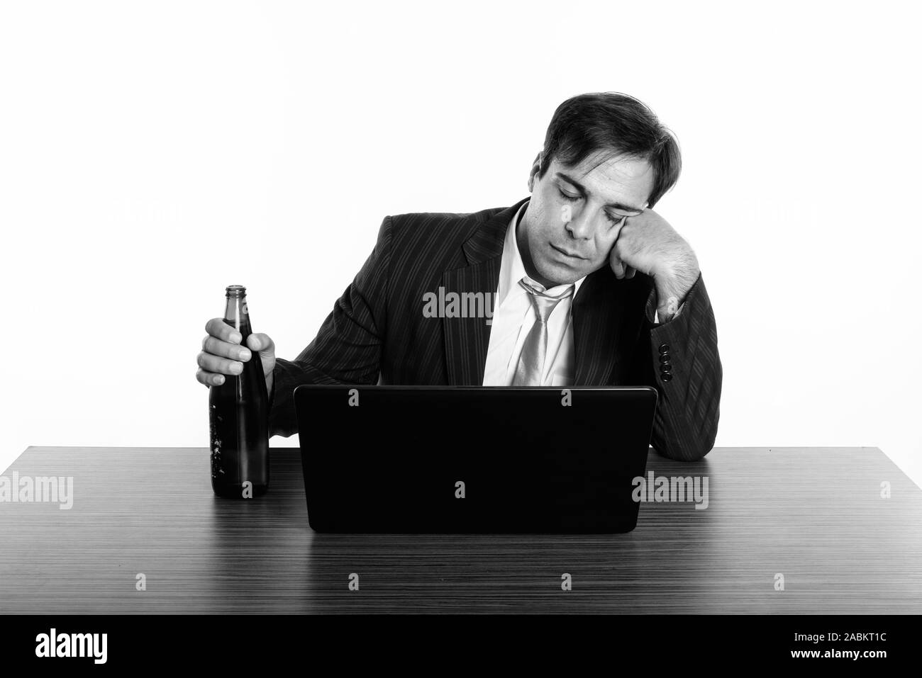 Drunk man sitting table alcohol hi-res stock photography and images - Alamy