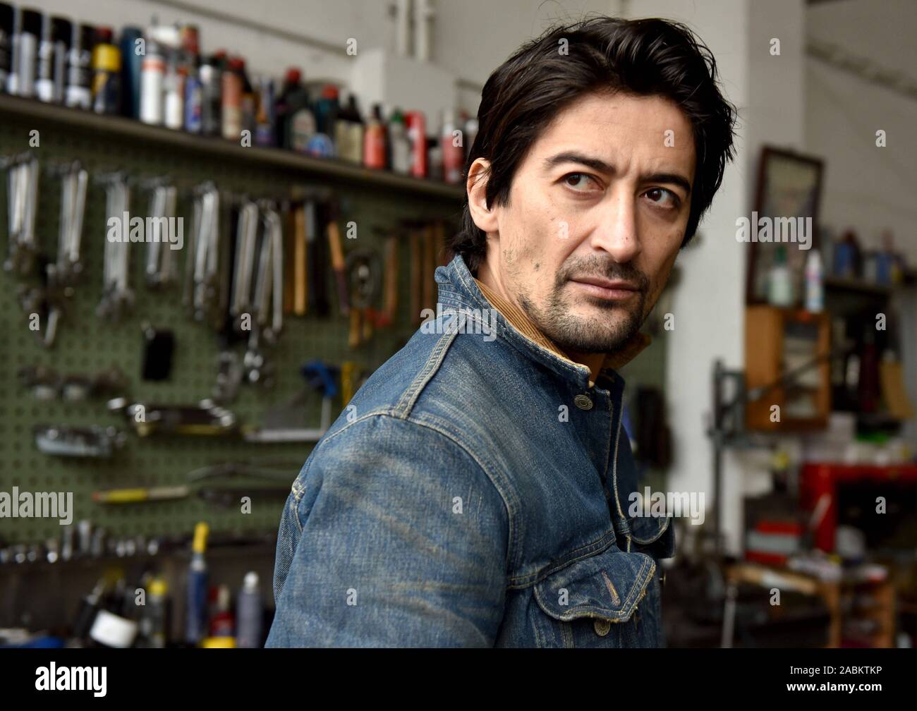 Actor Adrian Can in his brother's garage at Stahlgrubering in Munich ...
