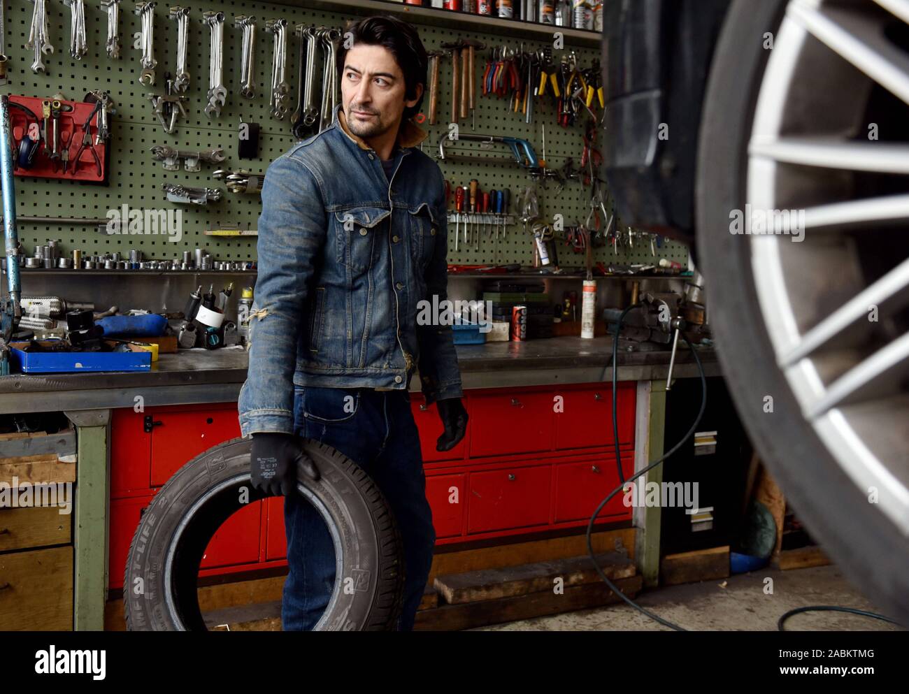 Actor Adrian Can in his brother's garage at Stahlgrubering in Munich ...