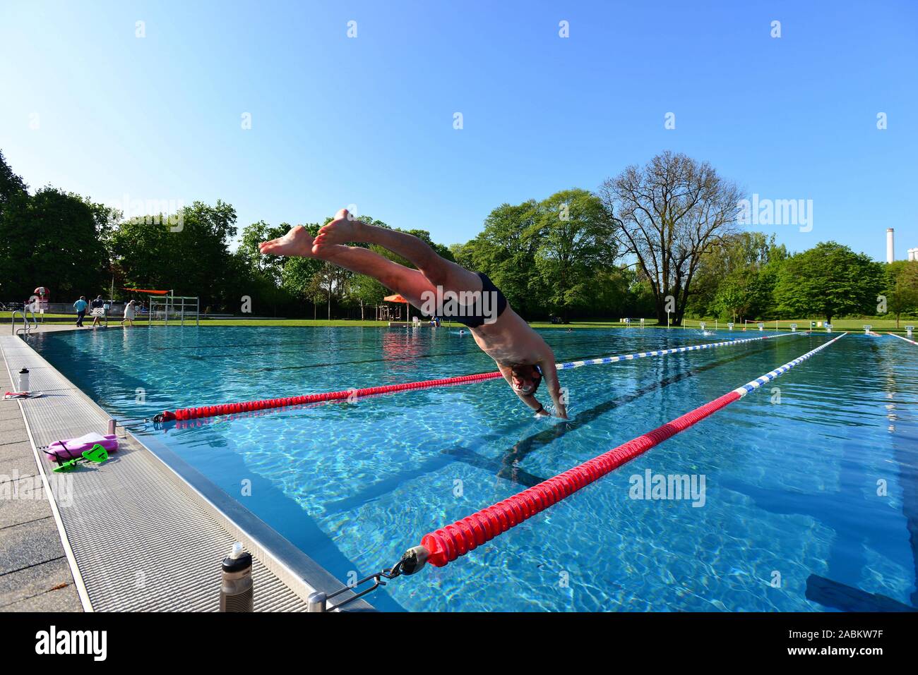 Swimmers on the opening day of the 2019 outdoor swimming pool season at ...