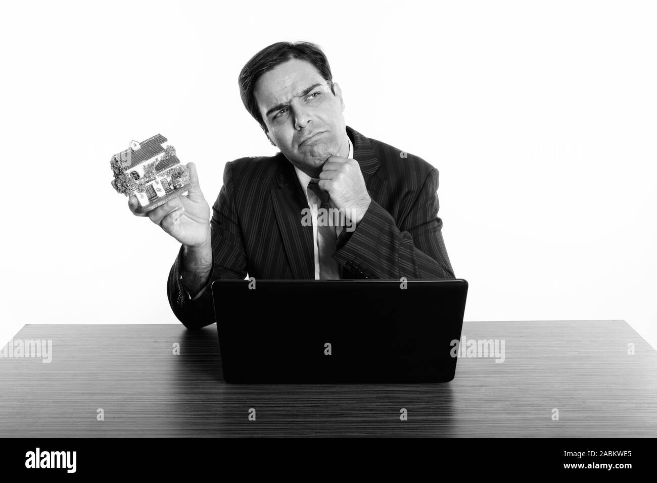 Wooden figurine house white background hi-res stock photography and ...