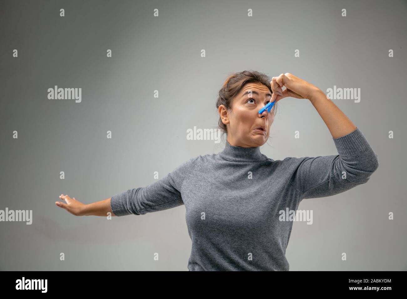 Stop it. Caucasian woman wearing the respiratory protection pin clasp ...