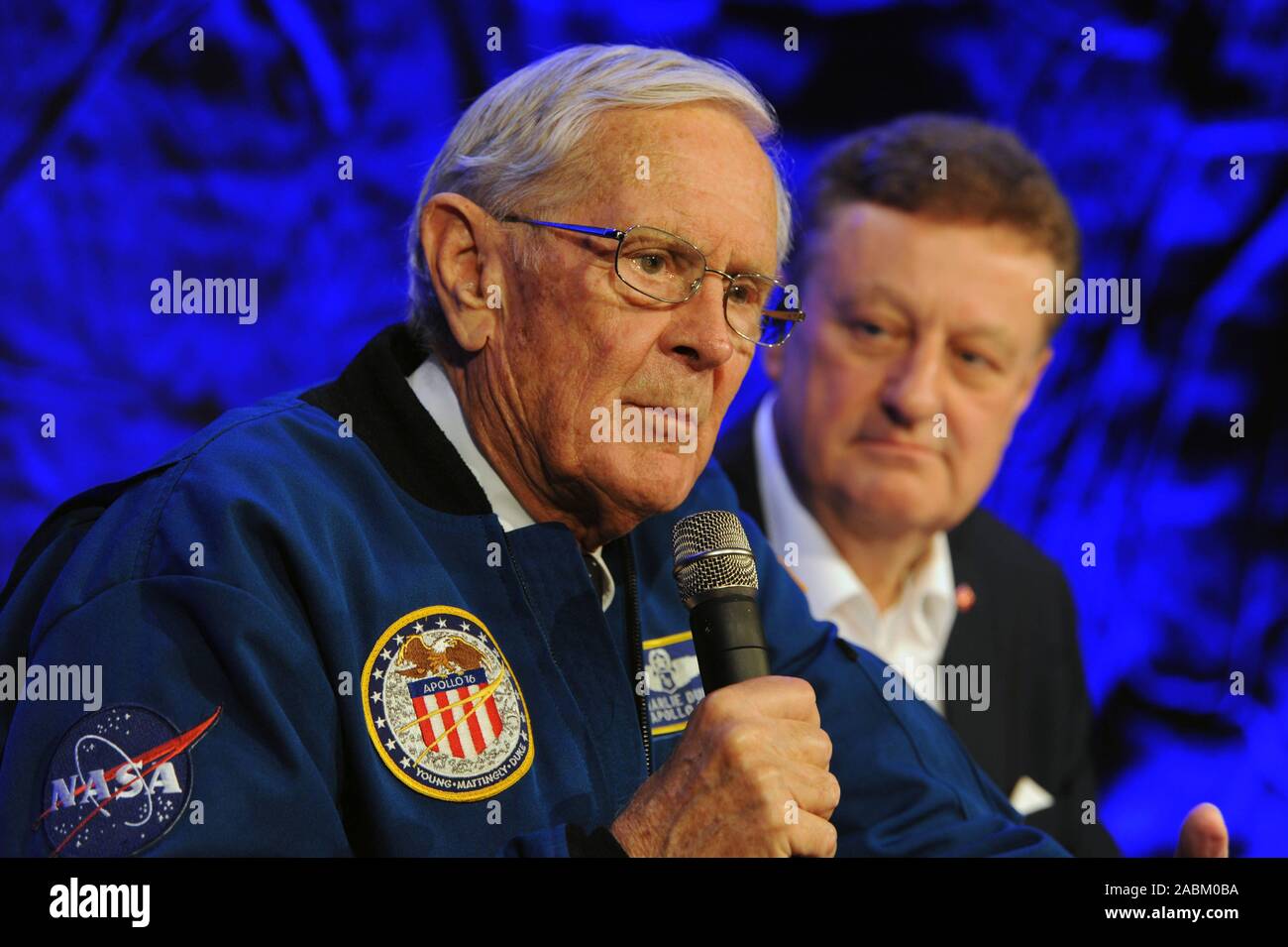 The US astronaut Charles "Charlie" Moss Duke (l.) talks about his ...
