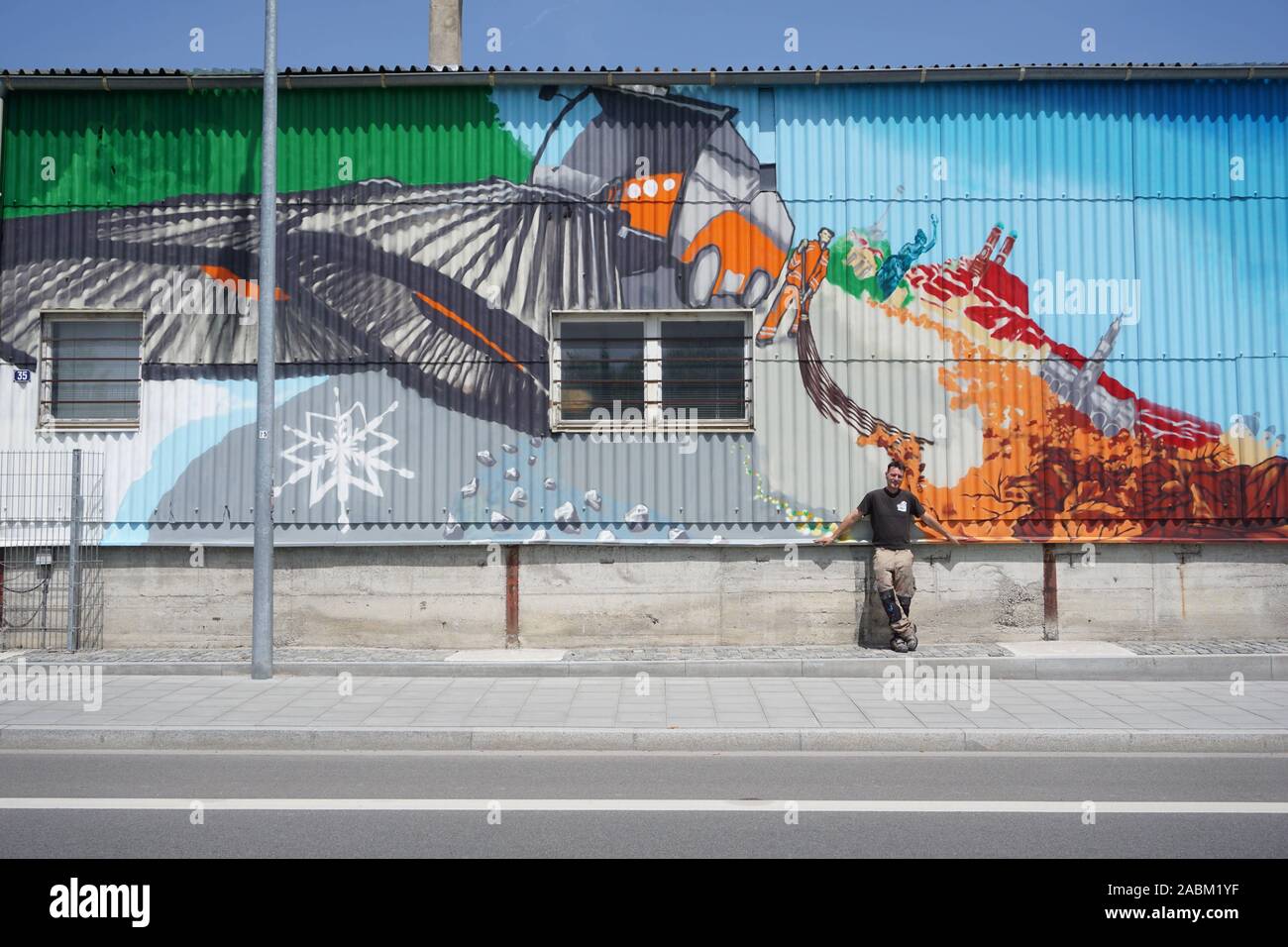 Graffiti artist Loomit (Mathias Köhler) in front of one of his ...