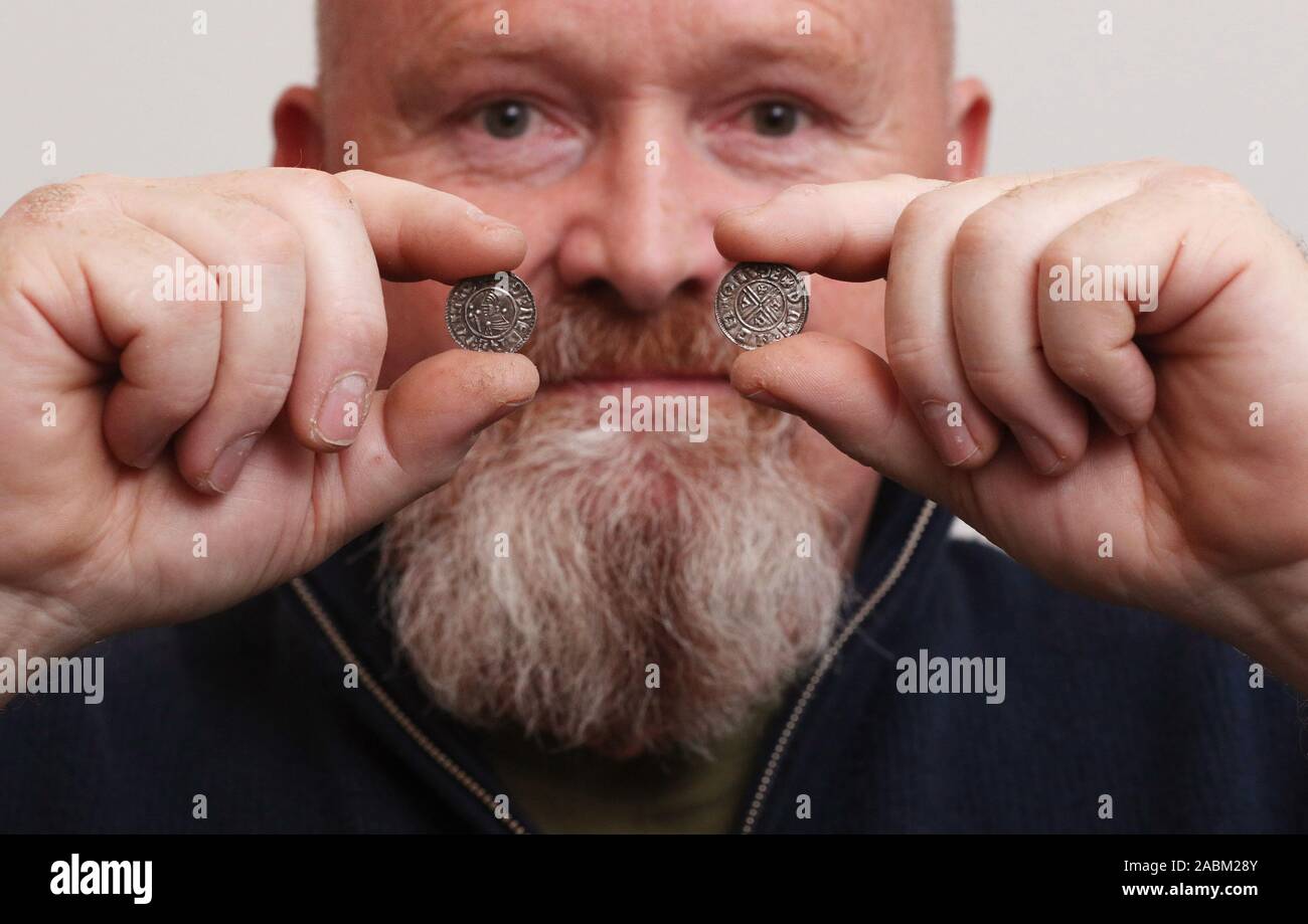 Builder and metal detectorist Don Crawley holds two particularly rare ...