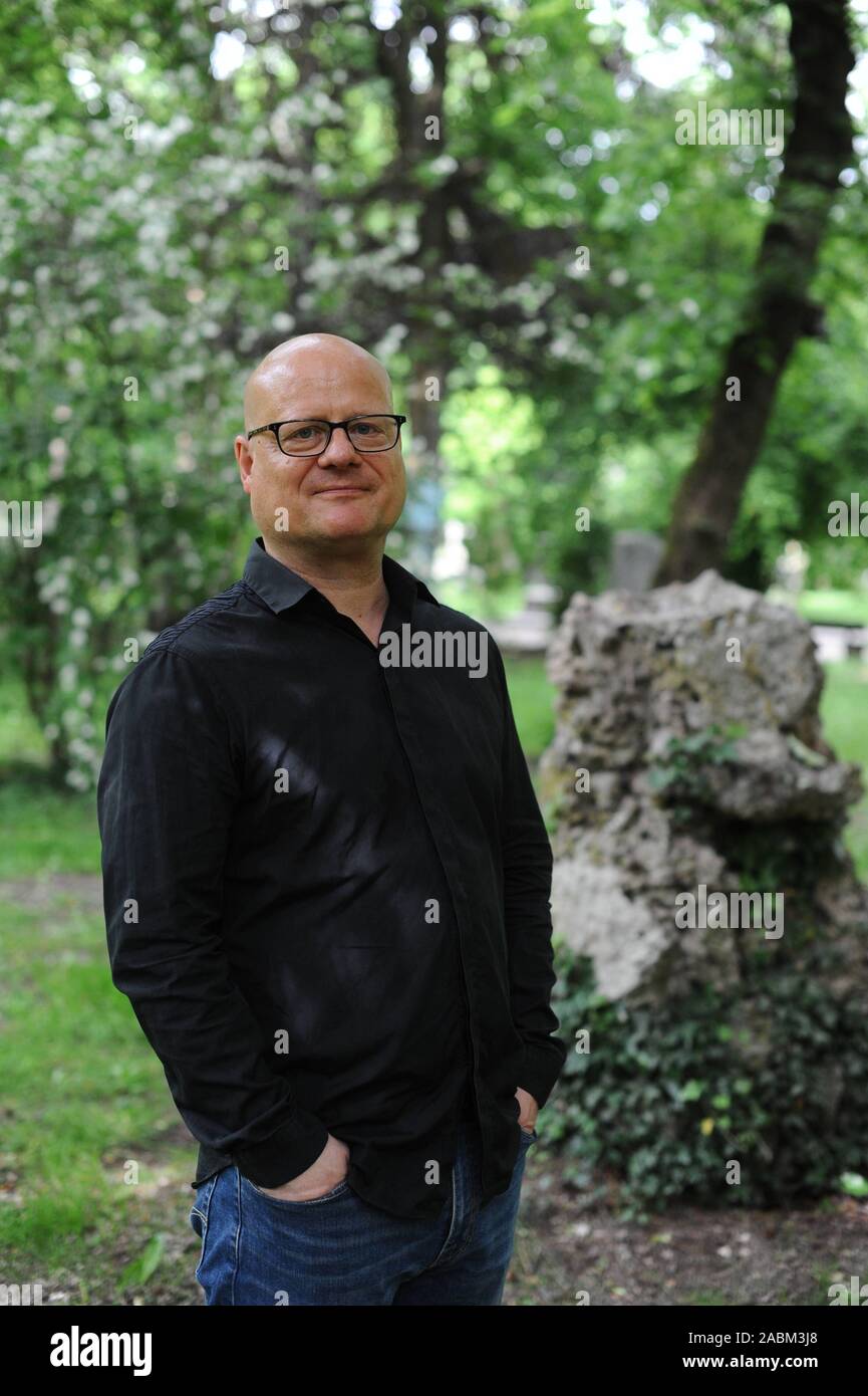 Author Christof Weigold, photographed in the Old Northern Cemetery in ...