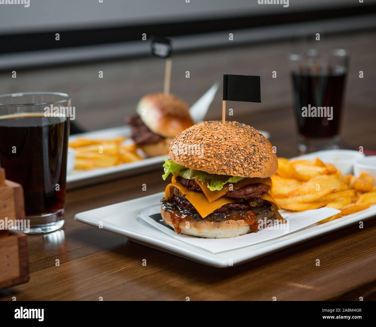 double cheeseburger with side fries Stock Photo - Alamy
