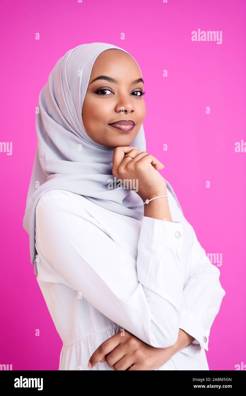 portrait of young modern muslim afro beauty wearing traditional islamic ...