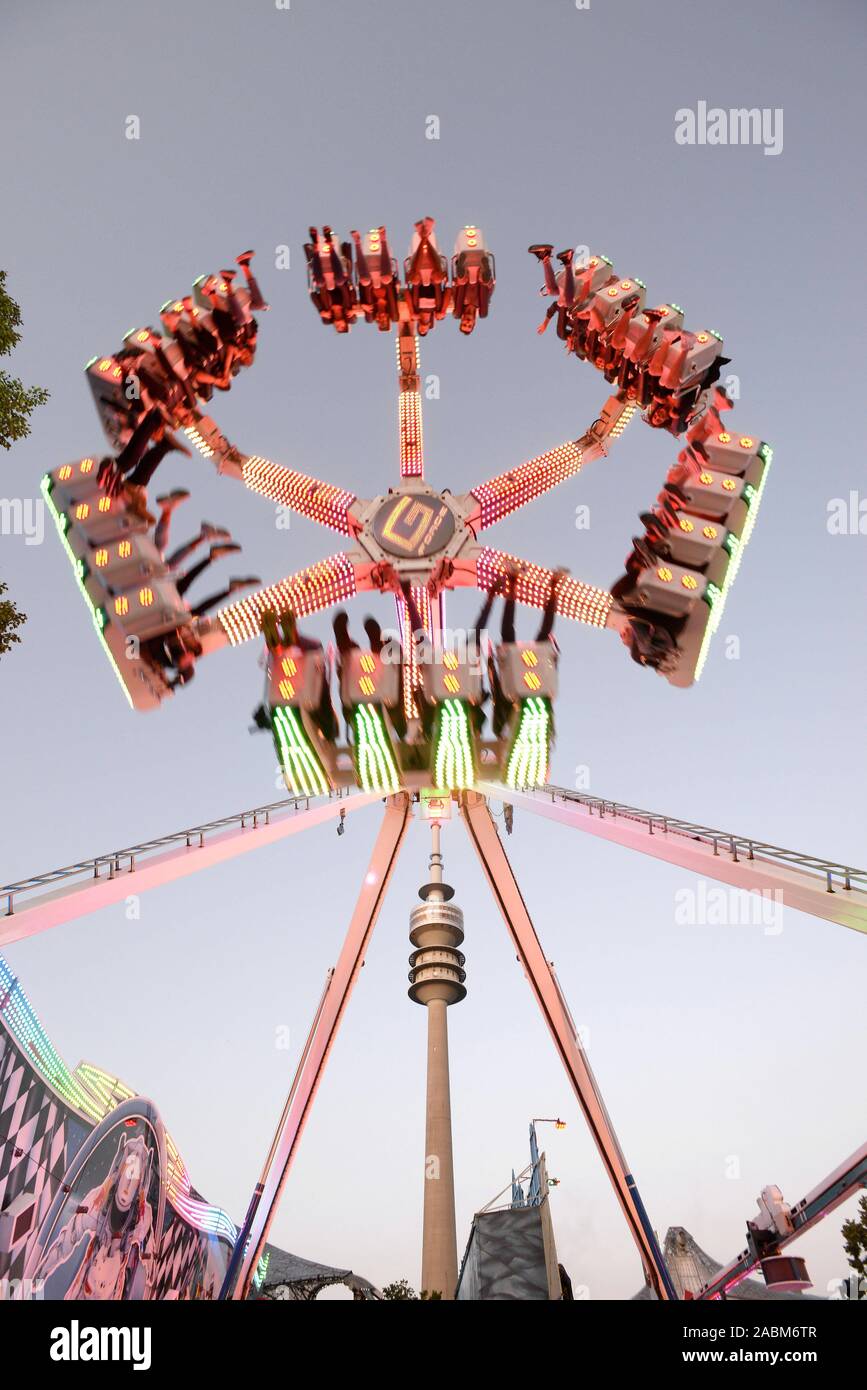 Rides at the Impark Summer Festival in Munich's Olympic Park. In the ...