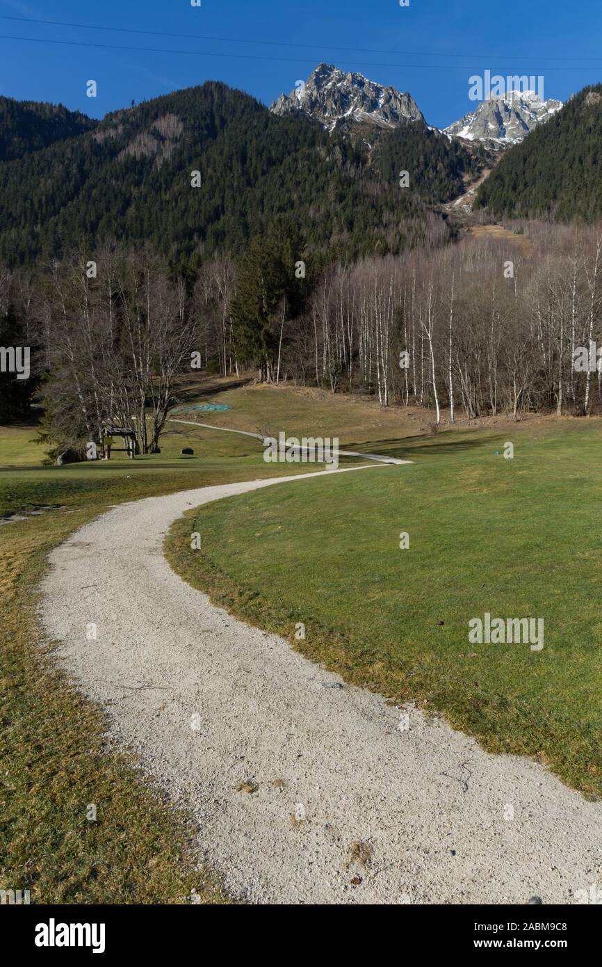 Curvy dirt path leading to mountains Chamonix Stock Photo - Alamy