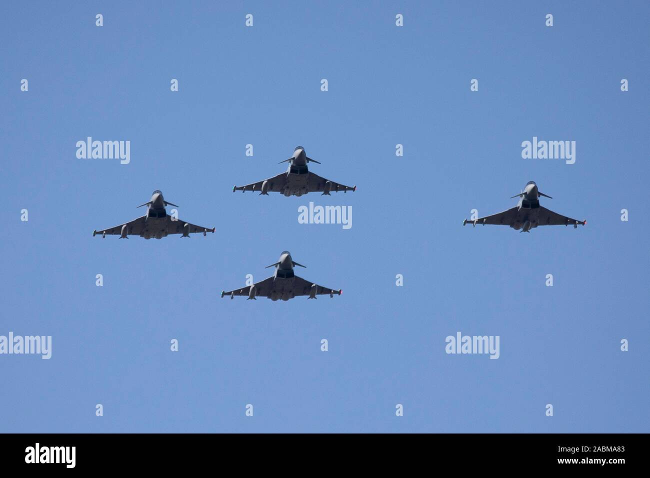 Formation of four aircraft Eurofighter fighter jets flying over ...