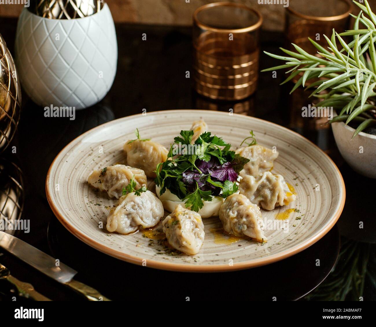 traditional food gyurza topped with herbs Stock Photo - Alamy