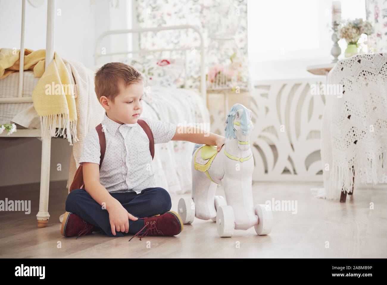 Cute little boy is going to school for the first time. Child with bag ...