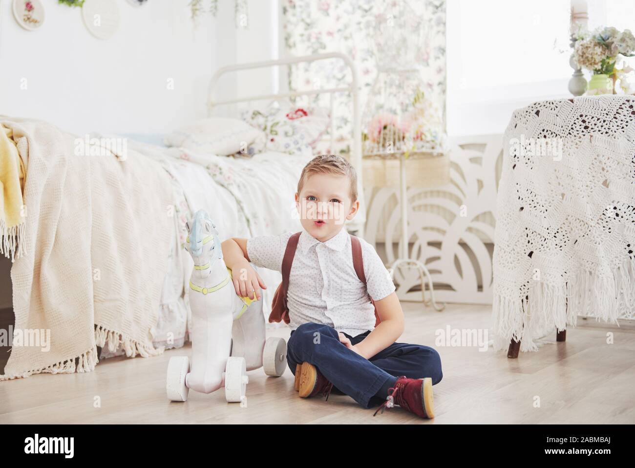 Cute little boy is going to school for the first time. Child with bag ...