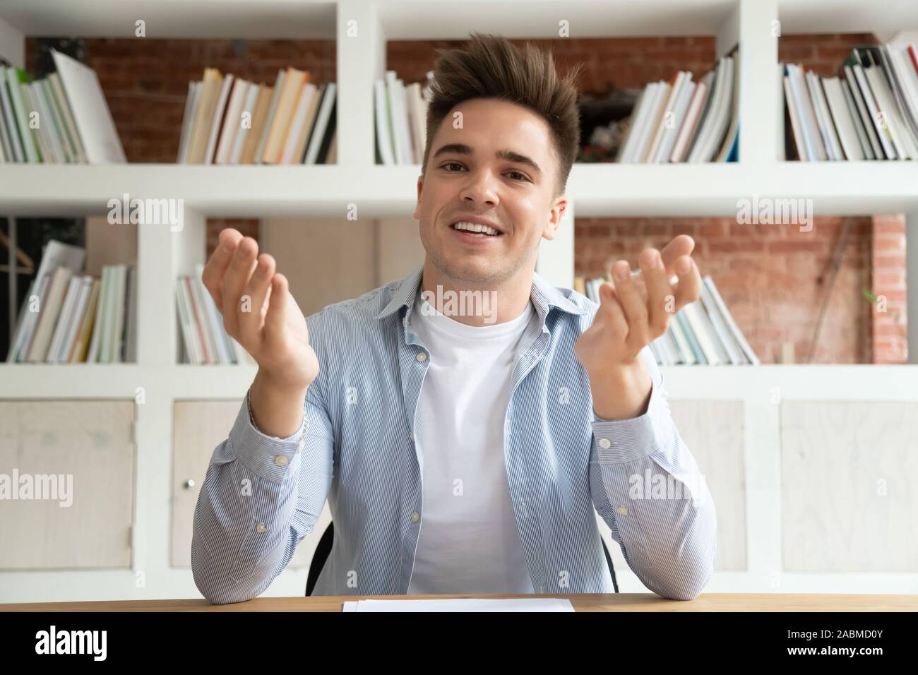 Young guy recording video for personal educational channel Stock Photo ...