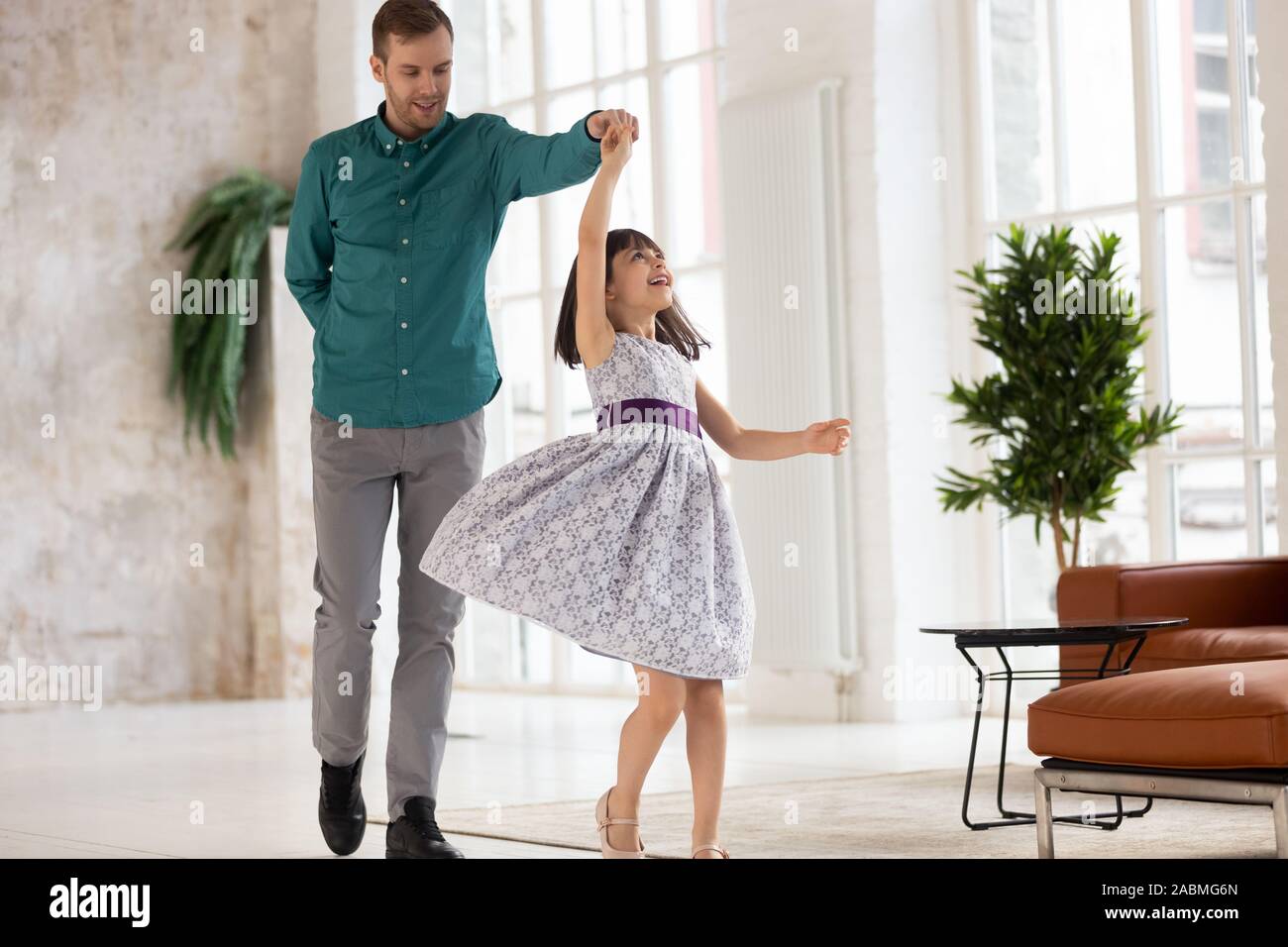 Father dancing waltz with daughter hi-res stock photography and images ...