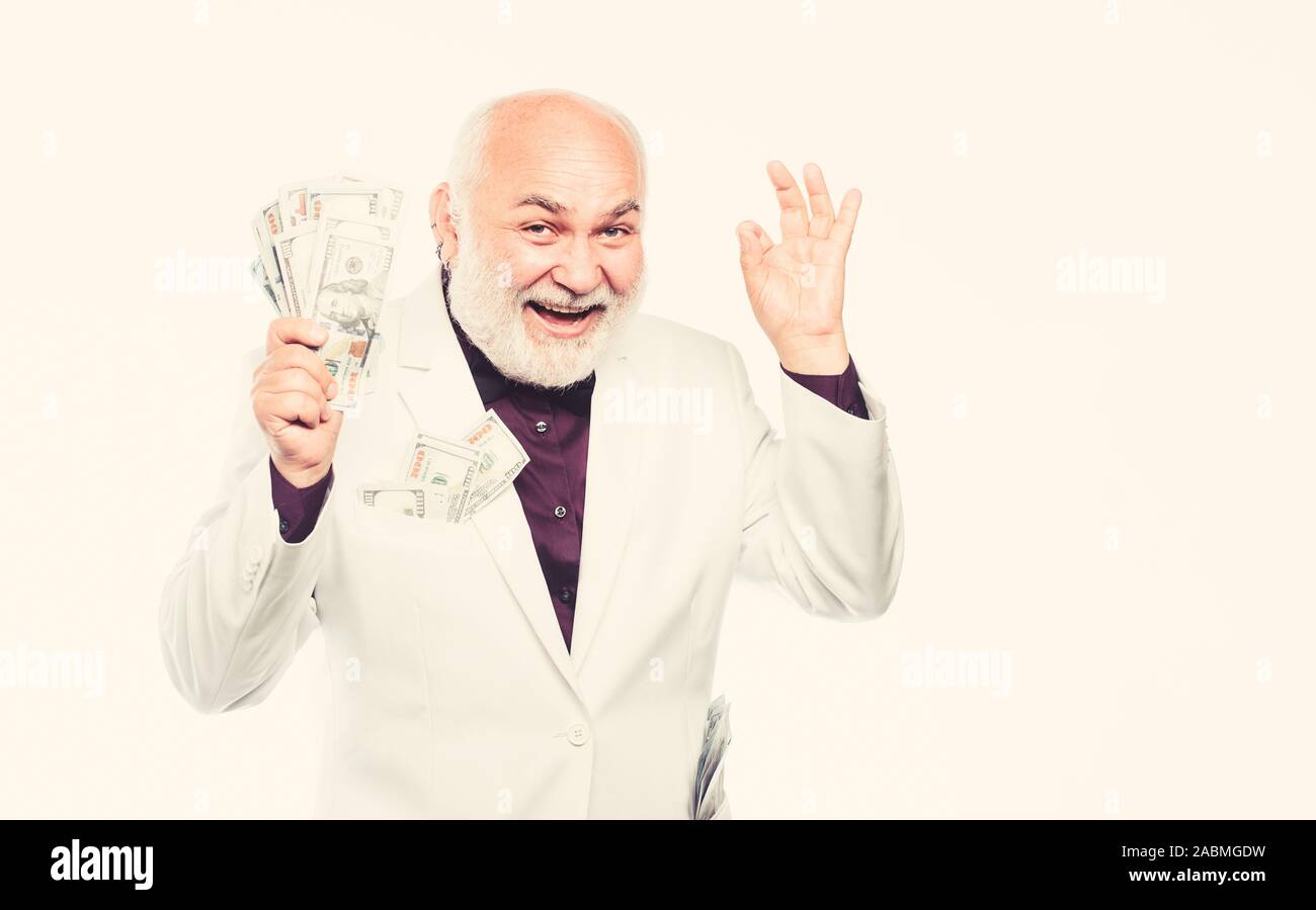 Currency. retirement. Happy lottery winner. mature bearded man with ...