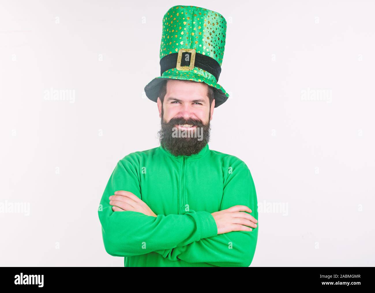 The raising of the green. Happy irish man with beard keeping arms ...