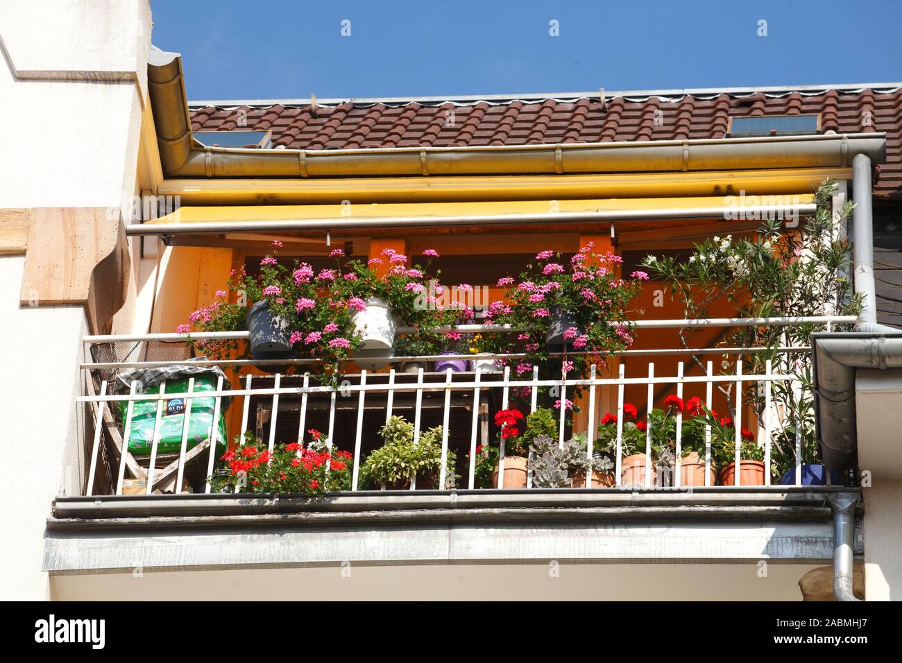 Balcony with flower boxes and awning, Heidelberg, Baden-Wuerttemberg ...