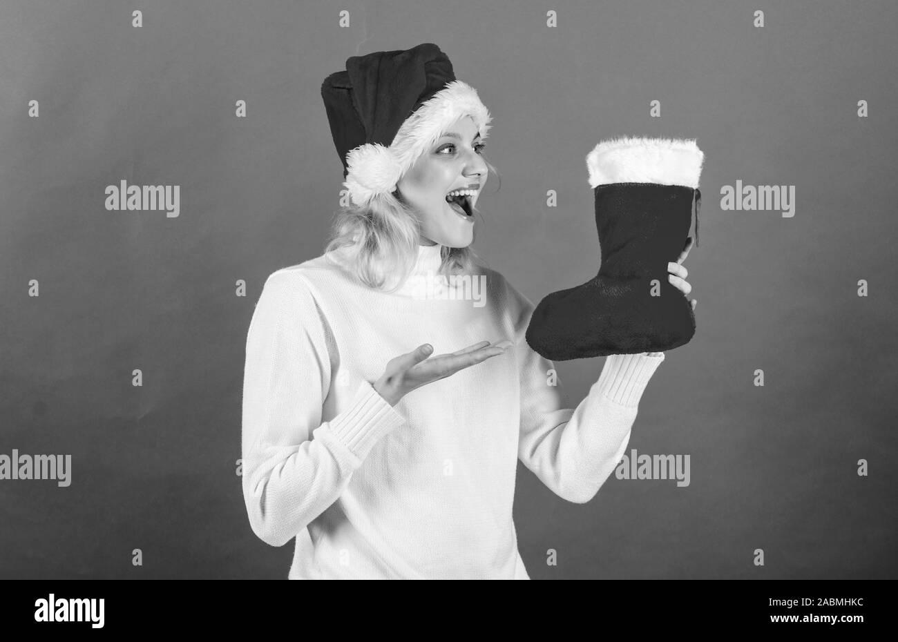 Woman santa hat gift Black and White Stock Photos & Images - Alamy