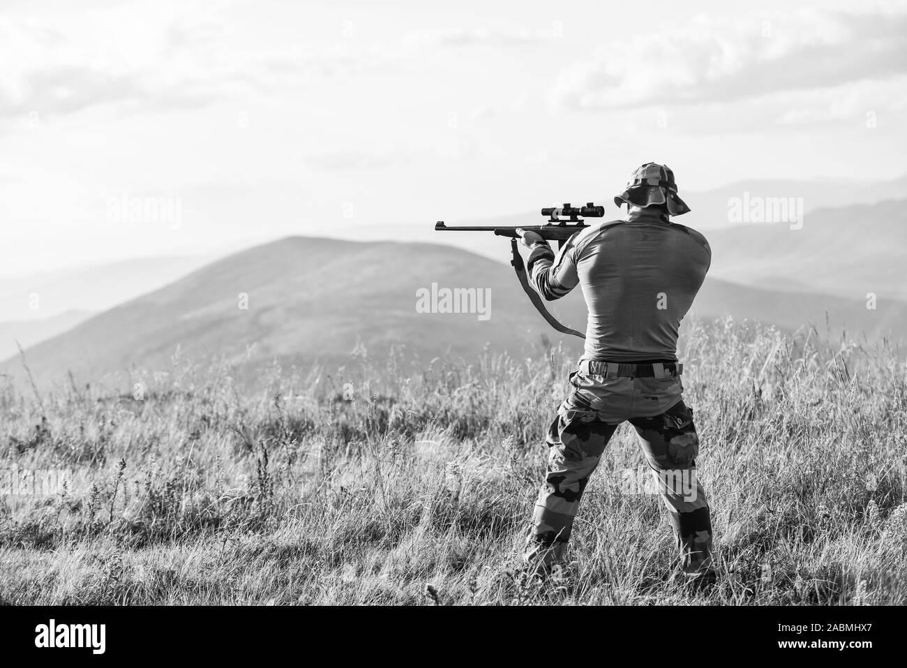 Nice shot. Rifle for hunting. Hunter hold rifle. Hunter mountains ...