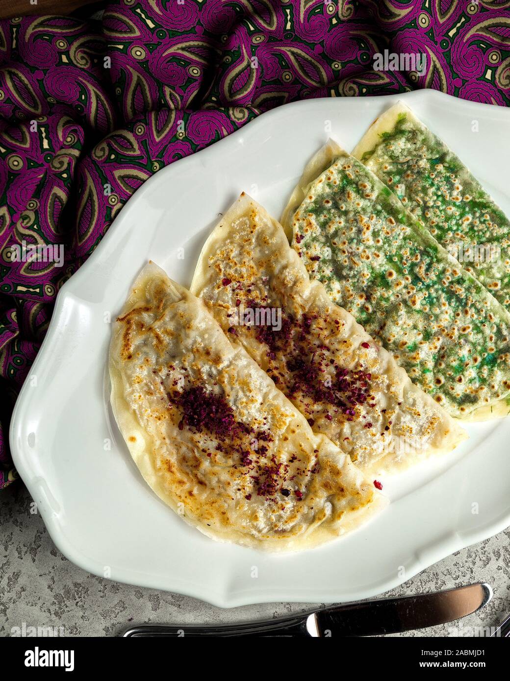 traditional qutab filled with meat and greenery Stock Photo - Alamy