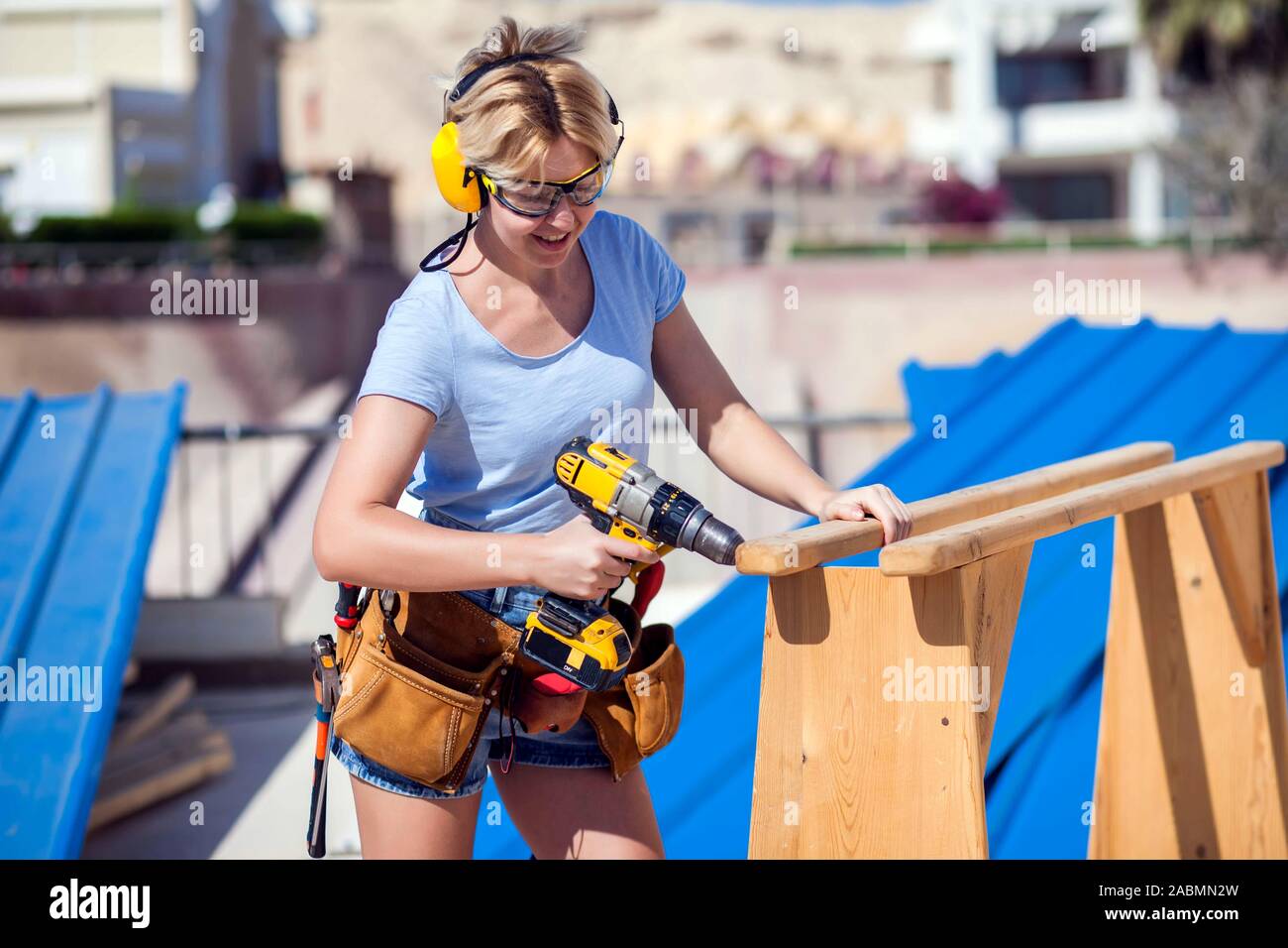 Female handyman drill hi-res stock photography and images - Alamy