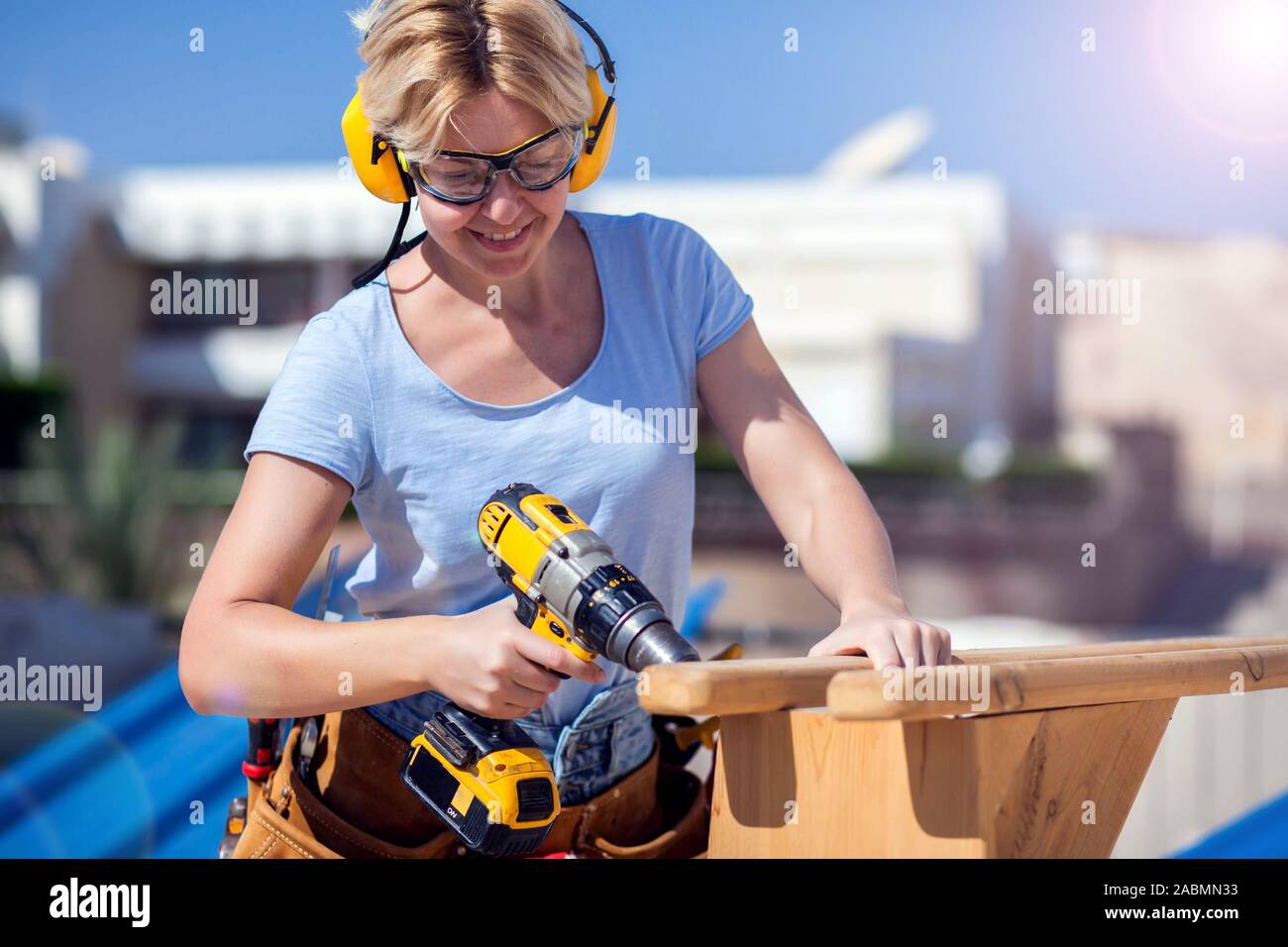 Female handyman drill hi-res stock photography and images - Alamy