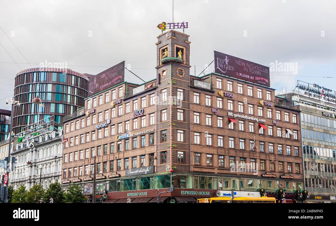 Building with giant thermometer and golden sculpture weather girl ...