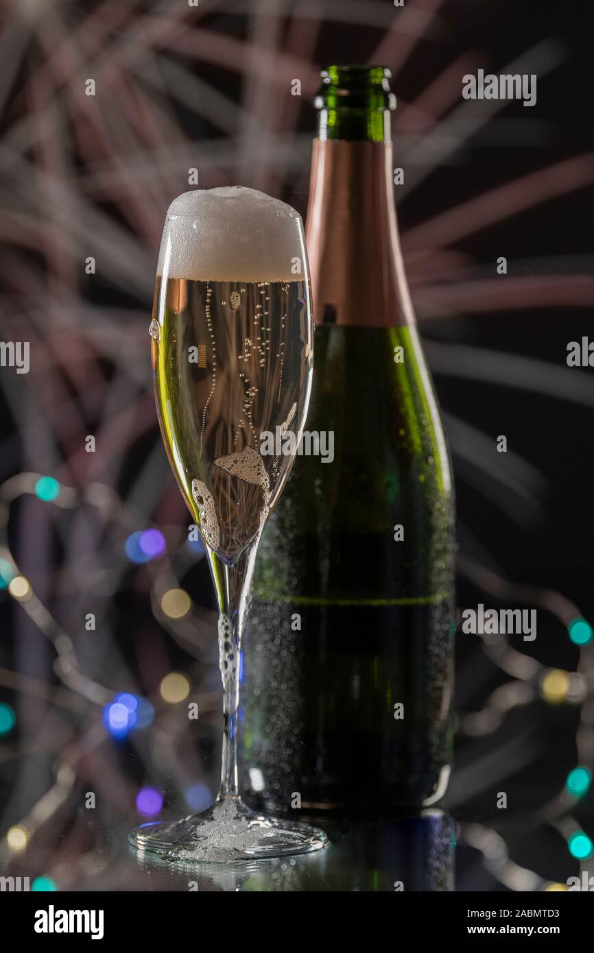 Sparkling champagne overflowing from an elegant glass cup Stock Photo ...
