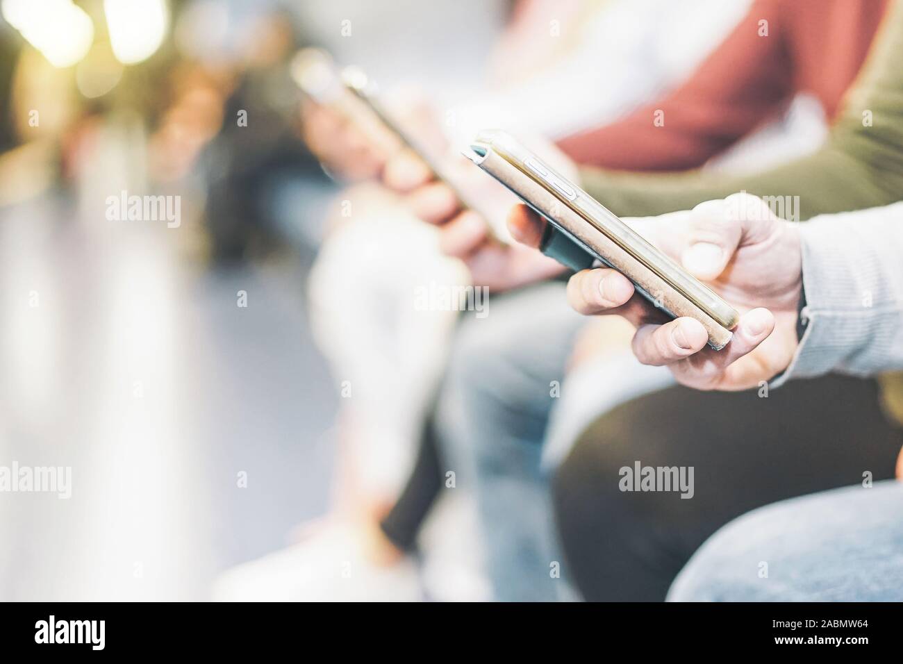 Group of millennial friends watching their smart mobile phones - New ...