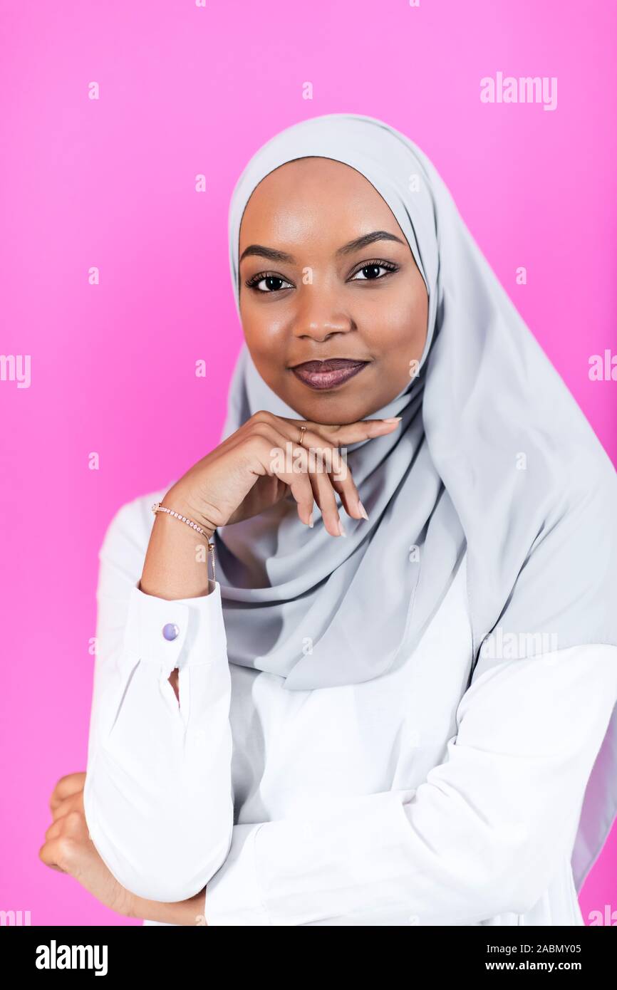 portrait of young modern muslim afro beauty wearing traditional islamic ...