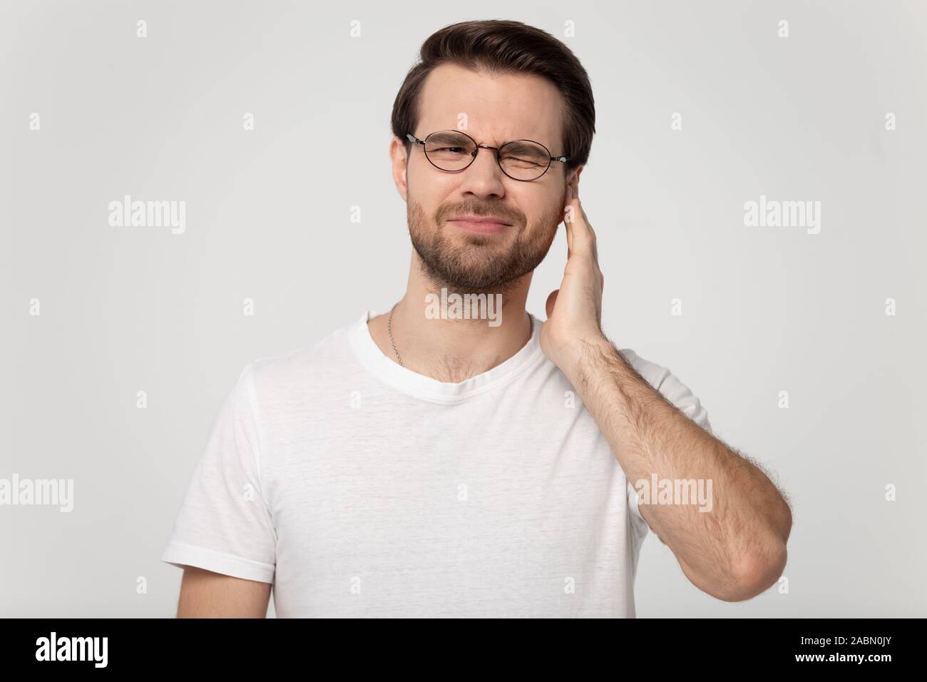 Touch the ear hi-res stock photography and images - Alamy