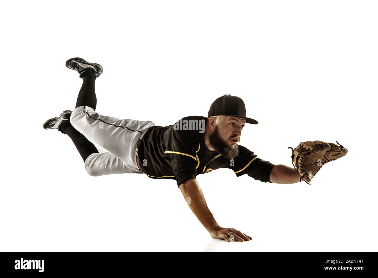 In flight. Baseball player, pitcher in black uniform practicing and ...