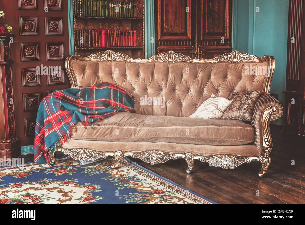 Luxury classic interior of home library. Sitting room with bookshelf ...
