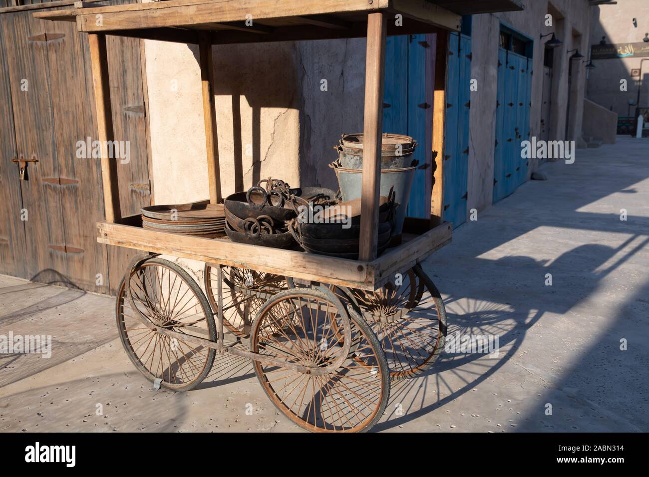 Wooden cart with pots in Al Seef, Dubai Stock Photo - Alamy