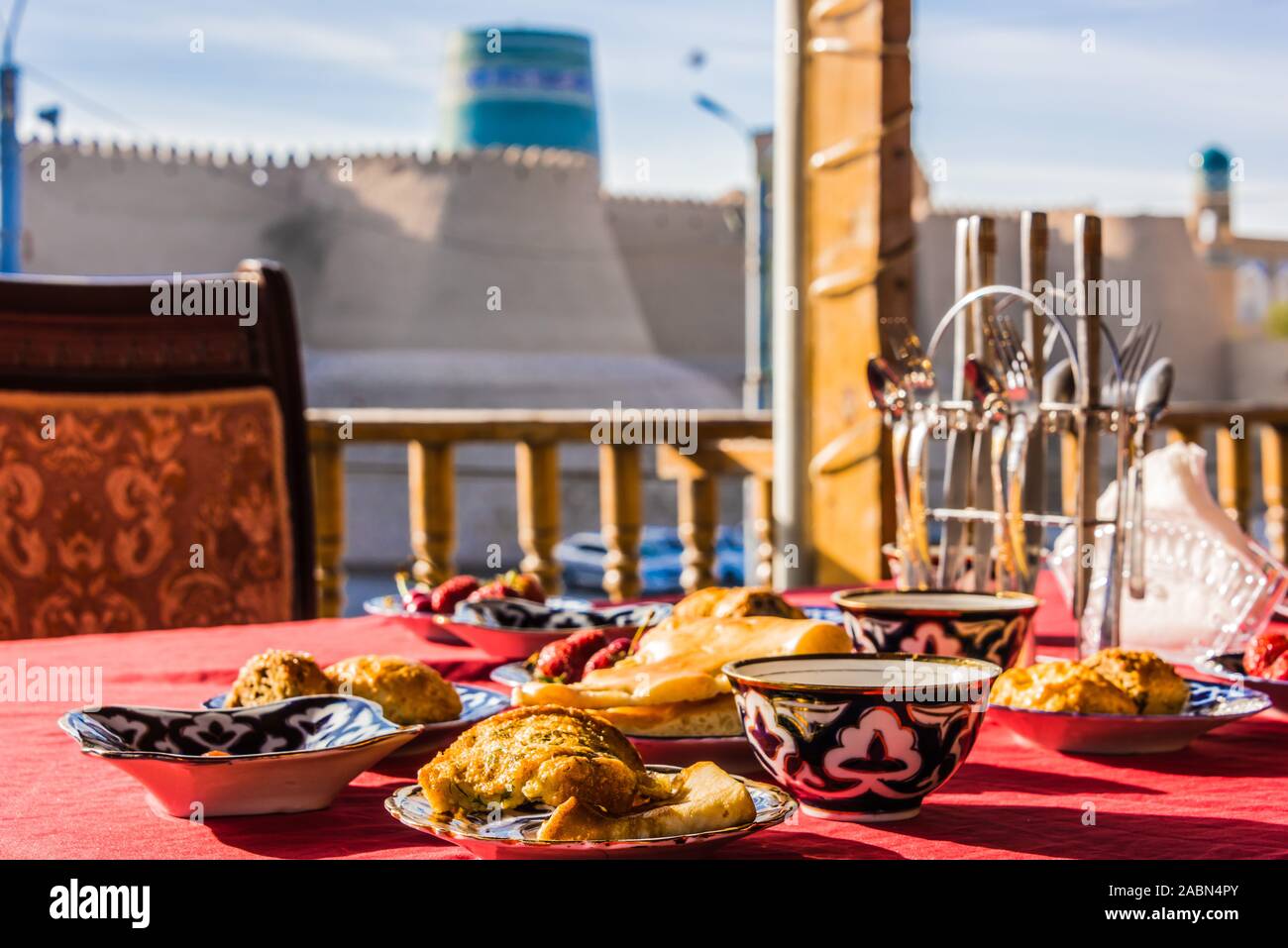 Traditional Uzbek breakfast served on the terrace Stock Photo - Alamy