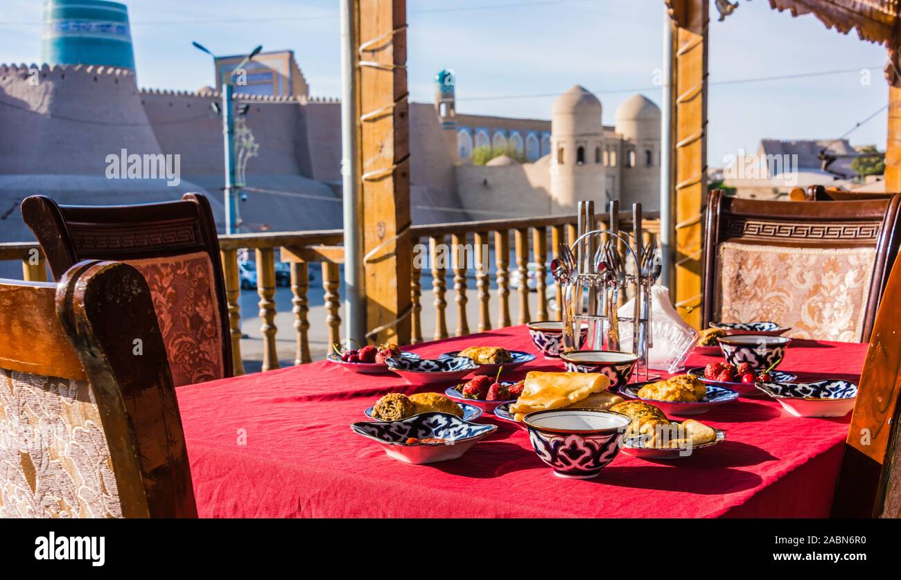 Traditional Uzbek breakfast served on the terrace Stock Photo - Alamy