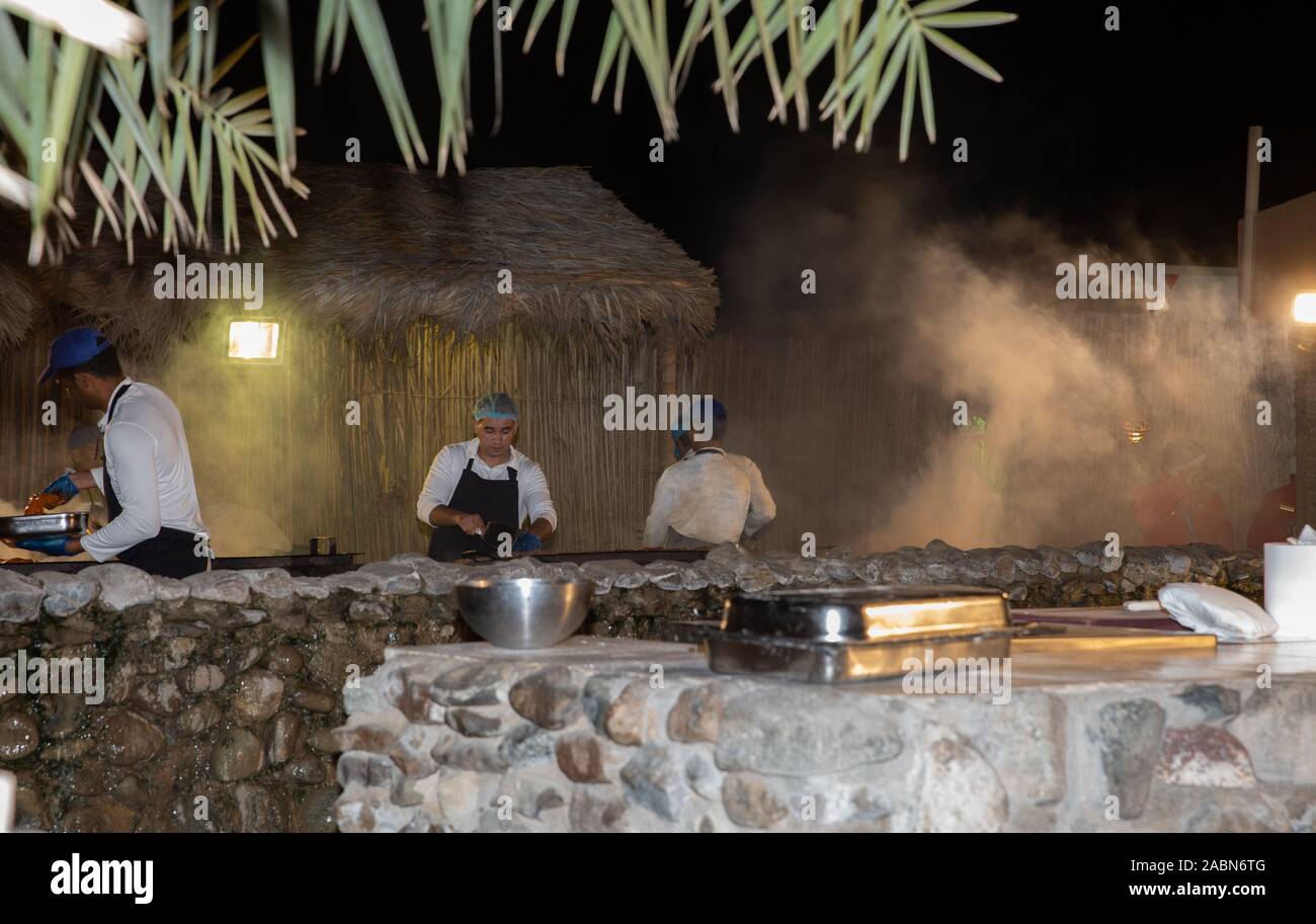 People cooking on BBQS during an Arabian Adventures Desert Safari in ...