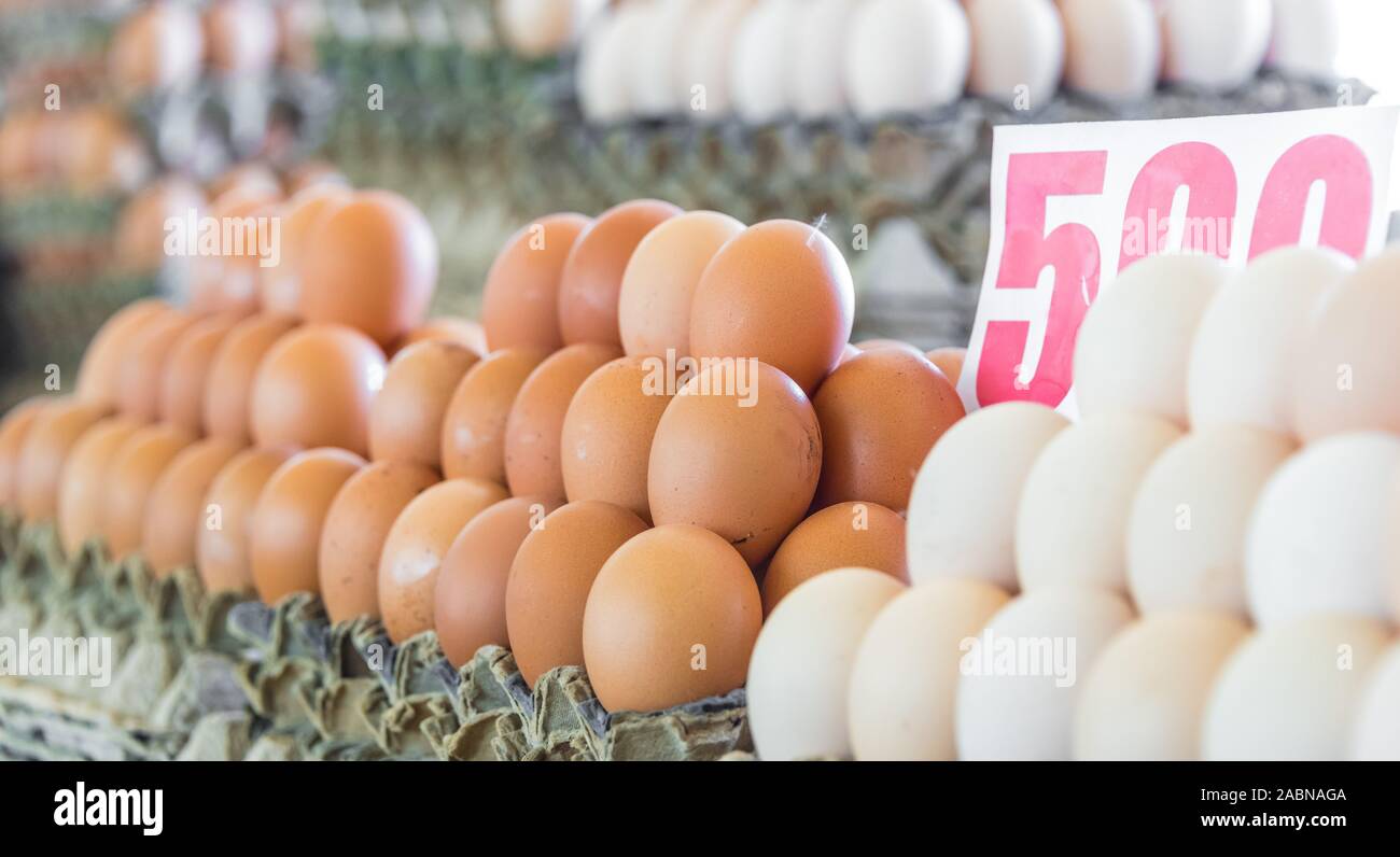 Fresh chicken eggs sold on the street market stall Stock Photo - Alamy