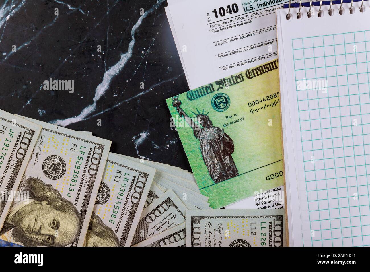 Refund check US., 1040 individual tax return form Tax return and dollar ...