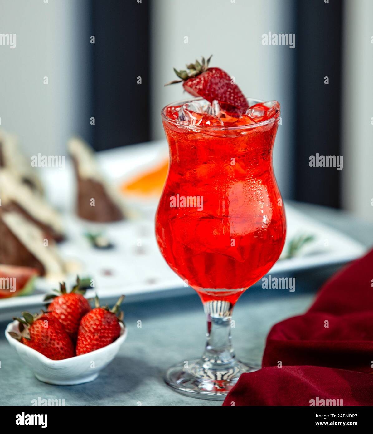 strawberry chilled drink with a slice of strawberry Stock Photo - Alamy