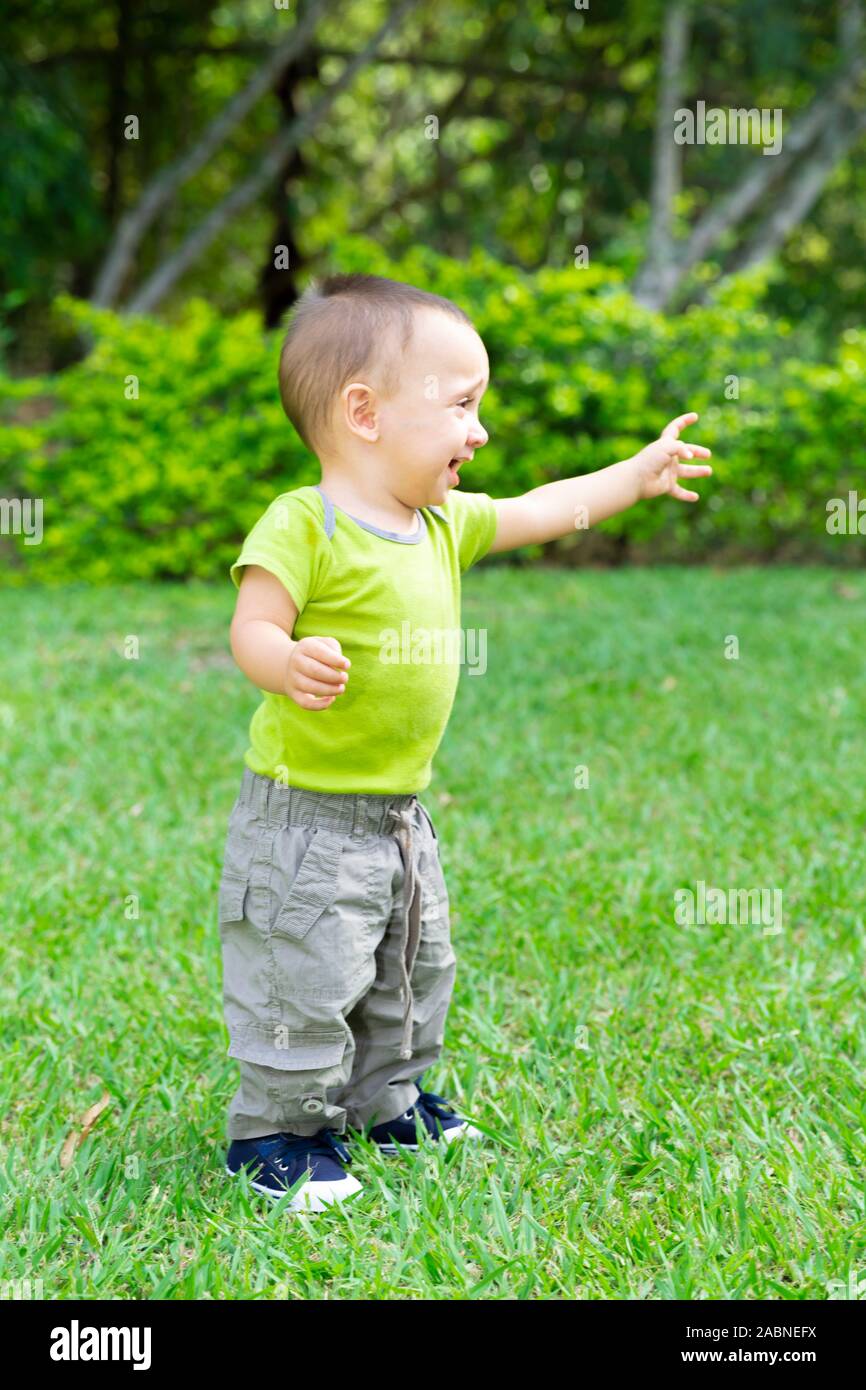 Boy screaming grass hi-res stock photography and images - Alamy