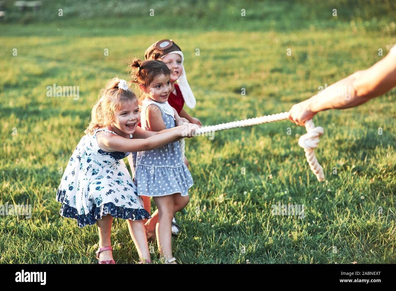 Pulling a rope game going so fun. Thats was is looks like to have good ...