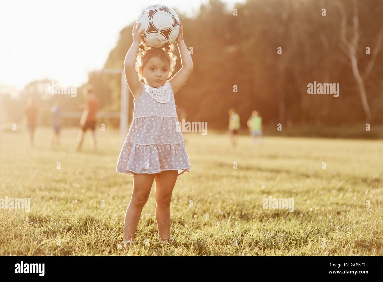 Soccer girl heads ball hi-res stock photography and images - Alamy