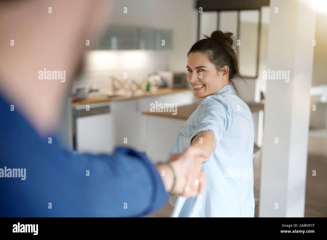 Woman pulling mans hi-res stock photography and images - Alamy