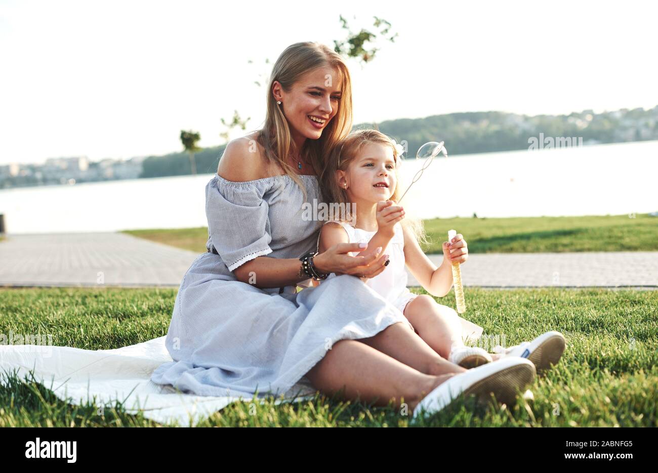 Happiness is in small things. Photo of young mother and her daughter ...