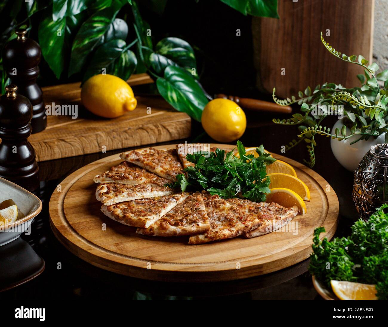 turkish lahmajun with greens and lemon slices Stock Photo - Alamy