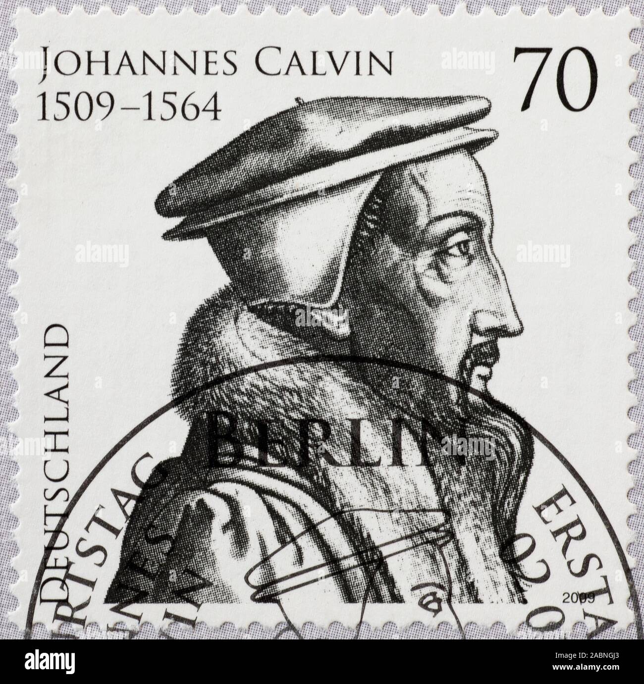 Portrait of John Calvin on german postage stamp Stock Photo - Alamy